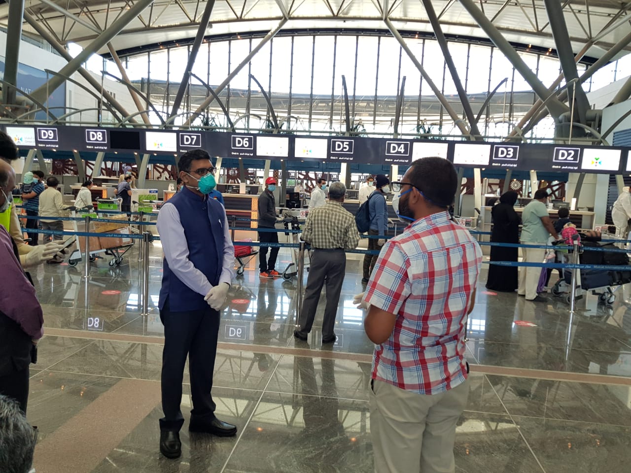 GLIMPSES: Air India Express Flight IX 442 - passengers check in - Black ...